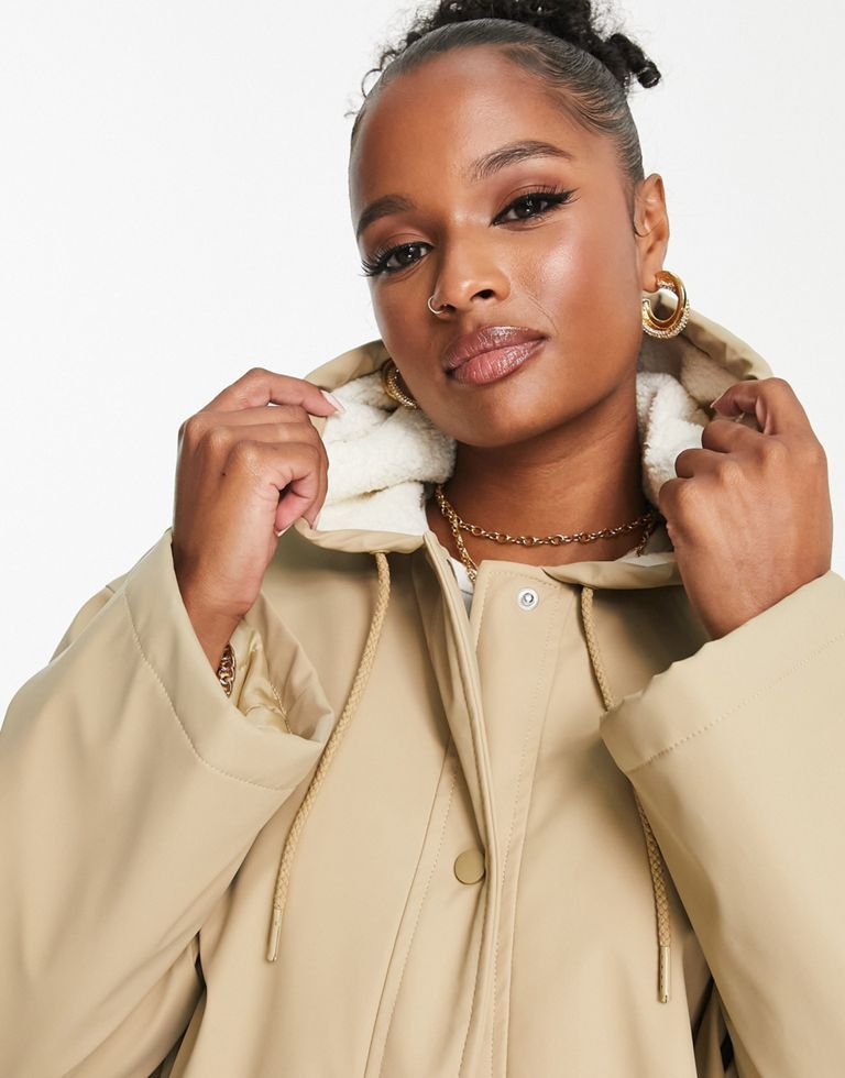 ASOS DESIGN Petite rubberised borg lined rain coat in stone-Neutral
