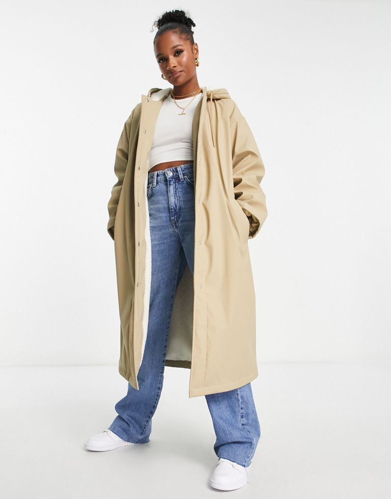 ASOS DESIGN Petite rubberised borg lined rain coat in stone-Neutral